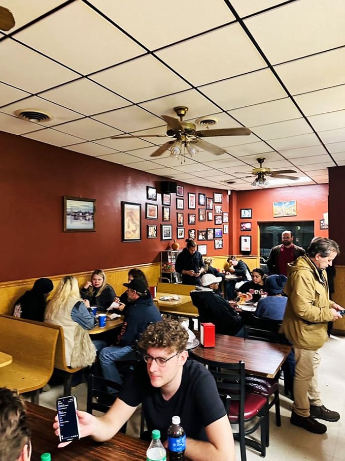 The dining room buzzes with the energy of people united in pizza appreciation&mdash;a cross-section of Pittsburgh enjoying life one slice at a time.