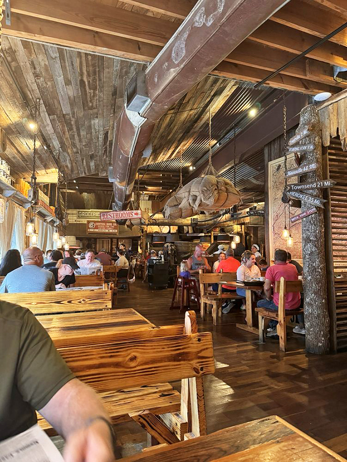 Where strangers become neighbors over coffee and pancakes, sharing the universal language of "mmm" beneath rustic wooden beams.