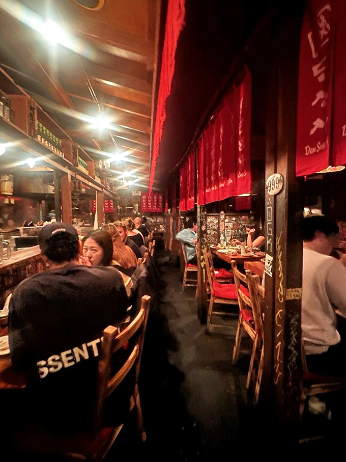 When Dan Sung Sa fills with diners, energy ripples through the space. The red banners overhead seem to pulse with the collective joy of everyone eating exceptionally well.