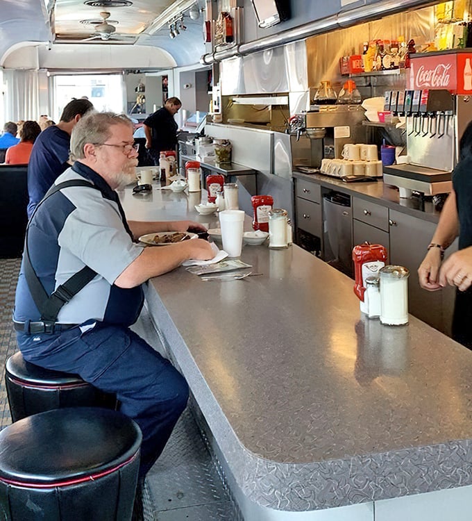 Real people enjoying real food - the kind of authentic dining scene that warms your heart.