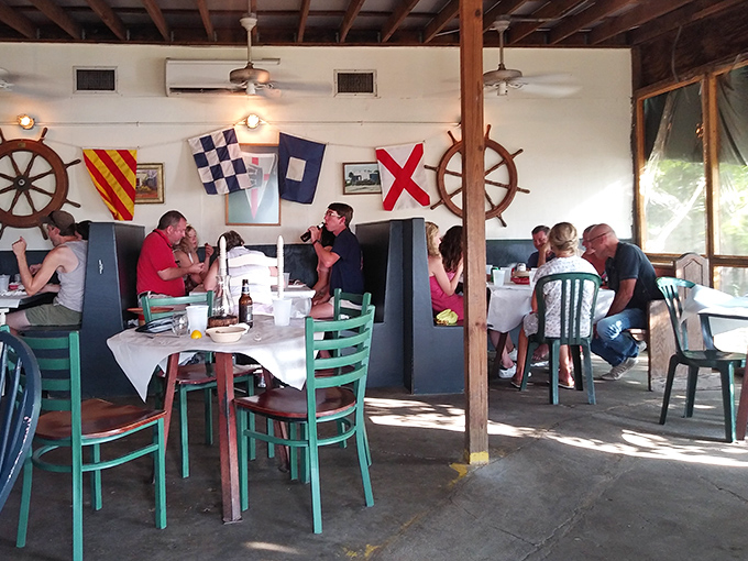 Nautical flags and ship wheels aren't kitschy decorations here&mdash;they're authentic touches in a place where the sea isn't a theme, but a way of life.