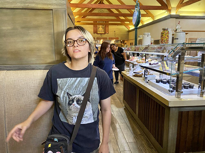 The dining room buzzes with the universal language of "mmm" as patrons navigate the delicate dance between wanting more and needing a nap.