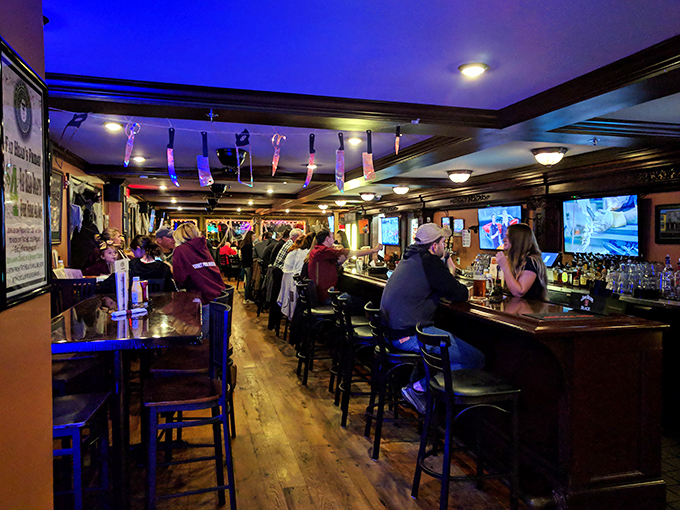 The buzz of conversation and clinking glasses creates that magical atmosphere where strangers become temporary neighbors over great food.