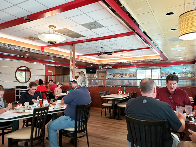 Real conversations happen in booths like these, where comfort food meets comfortable seating in perfect harmony.