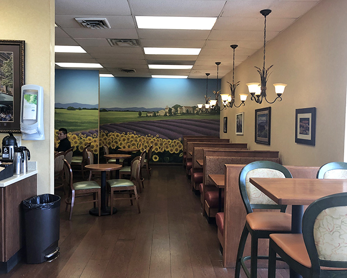 The dining area offers a peaceful retreat with its pastoral mural, where you can contemplate the meaning of life or just how you'll fit one more pastry in.