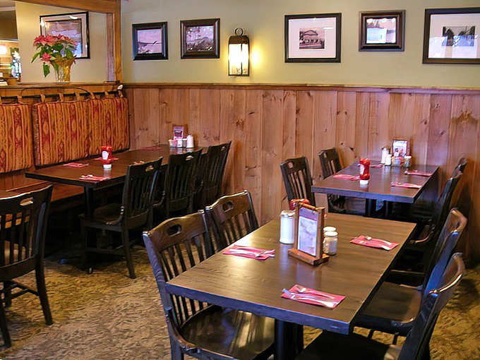 Cozy corners and wooden charm. The dining area feels like you've been invited to a friend's mountain cabin&mdash;if your friend were a culinary genius.