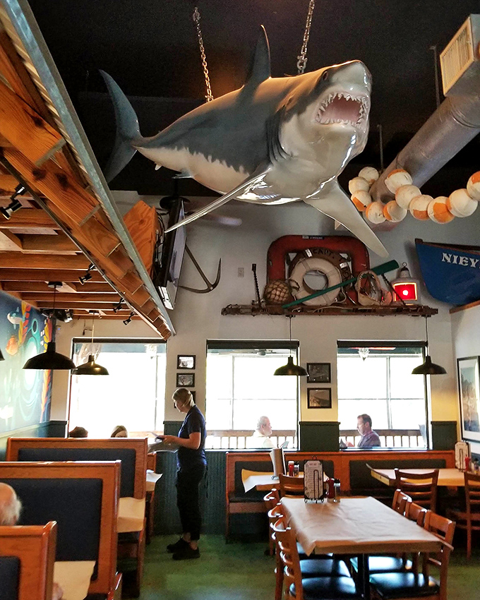 That shark isn't the only thing hanging around&mdash;diners linger too, savoring both seafood and the maritime atmosphere that surrounds them.