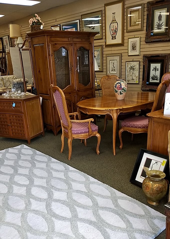 Ornate pedestals and vintage furnishings create an eclectic corner where Naples' penchant for the elegant meets the thrill of the unexpected find.