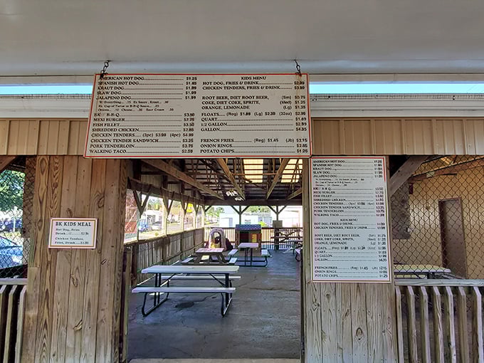 The entrance beckons with menu boards hanging like ancient scrolls, promising affordable delights in an era when "value menu" has become an oxymoron elsewhere.