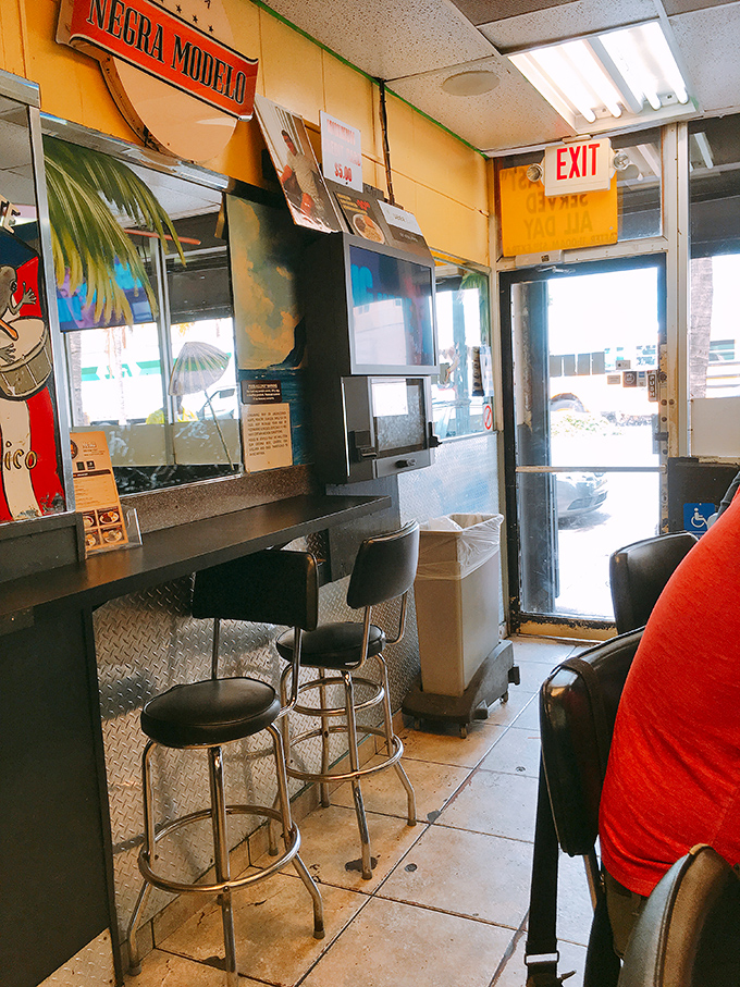 This modest corner with its beer signs and well-worn counter stools has likely witnessed more authentic Miami conversations than any luxury hotel lobby.