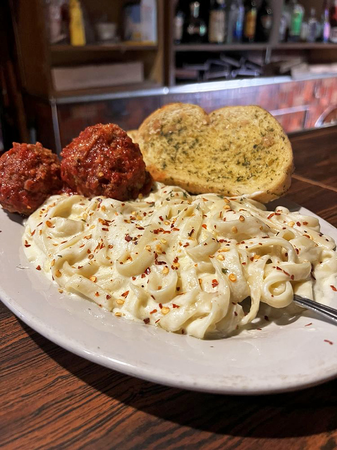 Fettuccine Alfredo with meatballs that would make an Italian grandmother nod in approval. Comfort food that hugs you from the inside out.