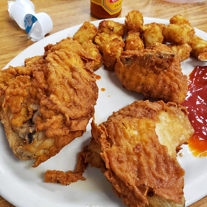 Fried chicken with a crust so perfect it makes you want to write poetry. Or at least take a picture for your food-obsessed nephew.