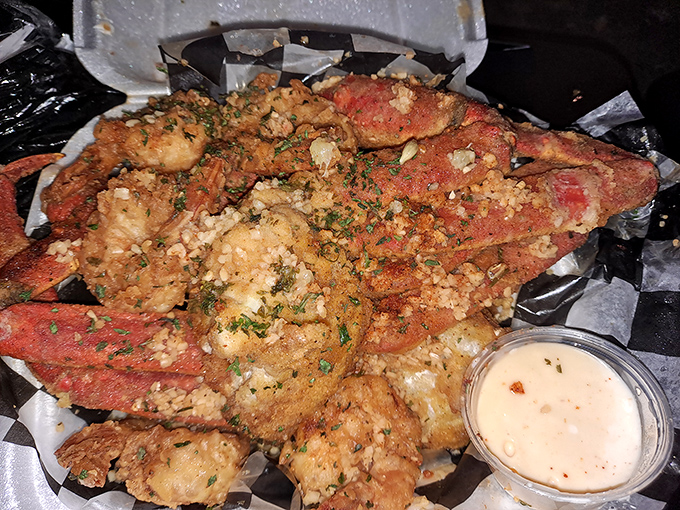 Crab legs worth getting your hands dirty for. That garlic butter sauce isn't just a condiment&mdash;it's the supporting actor that deserves its own award.