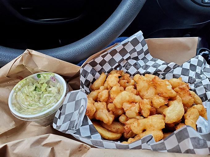 Golden treasures from the sea! These perfectly battered morsels of seafood goodness come with coleslaw that's worth eating&mdash;a coastal miracle in itself.