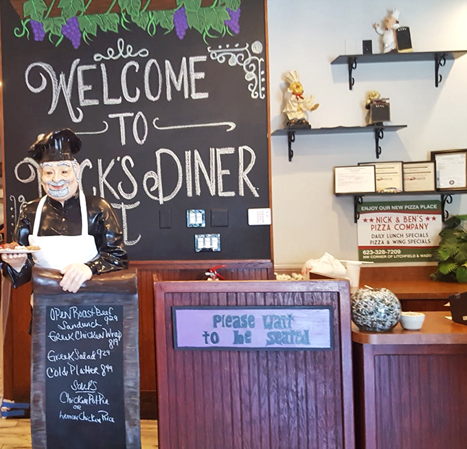Welcome indeed! The chef statue and chalkboard menu create that classic "you've arrived somewhere special" feeling every great diner needs.