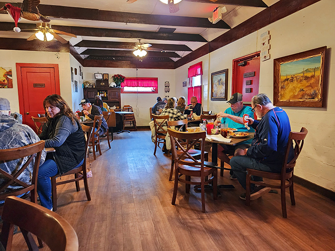 The dining room buzz &ndash; where locals and travelers unite in the democratic pursuit of good food and better conversation.