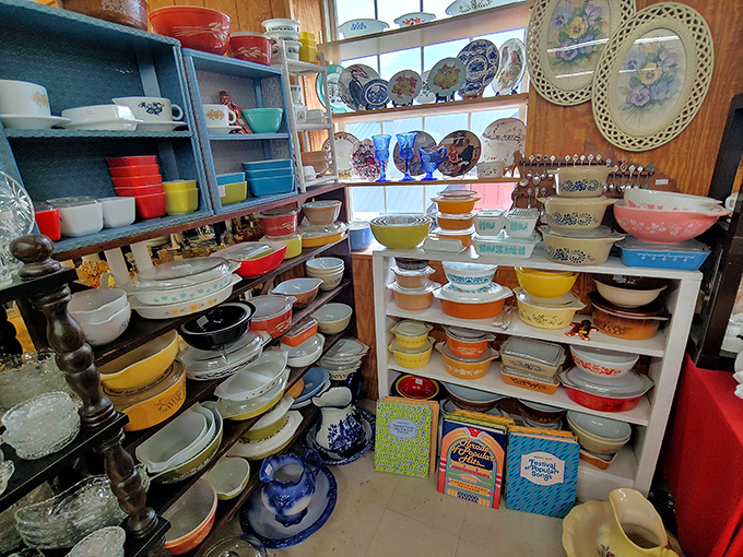 A rainbow of vintage Pyrex and kitchenware creates an irresistible display. Grandma's kitchen never really goes out of style, does it?
