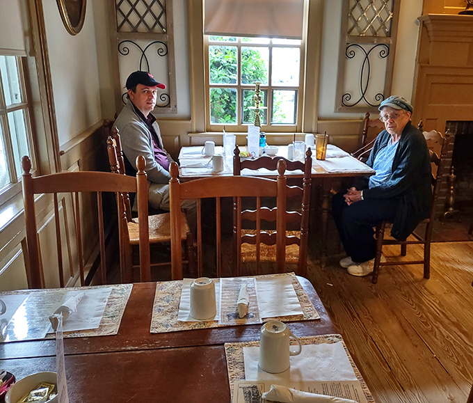The dining room hosts generations of stories. These tables have heard more Virginia history than most textbooks have printed.