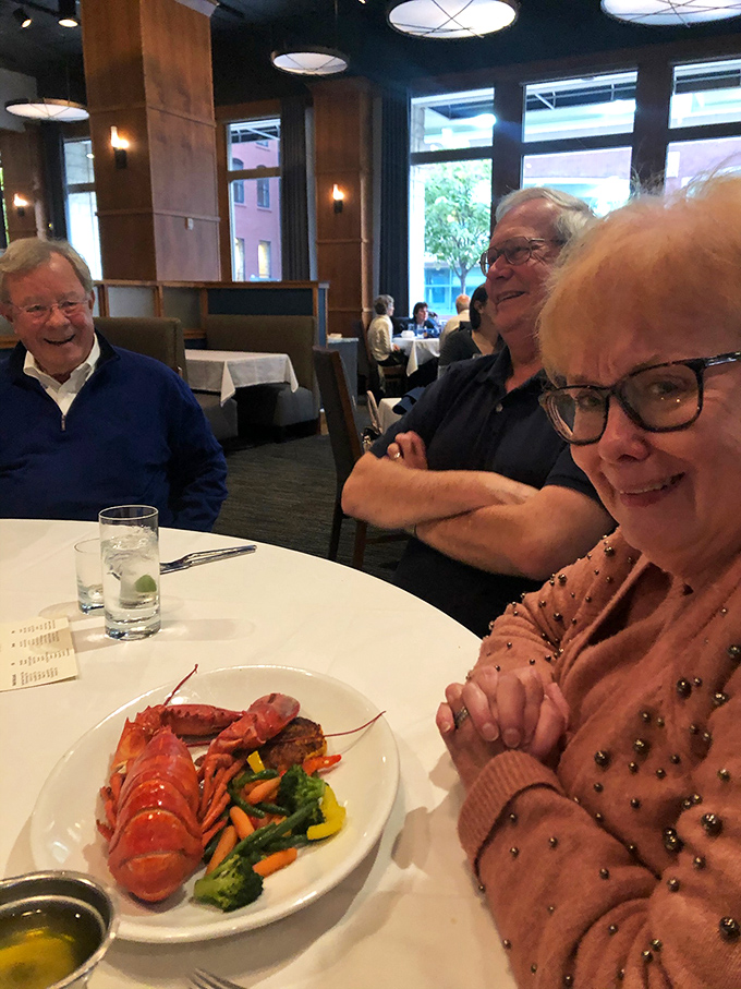 Nothing says "I made the right dining choice" like the look of pure joy when that first lobster bite hits the taste buds.
