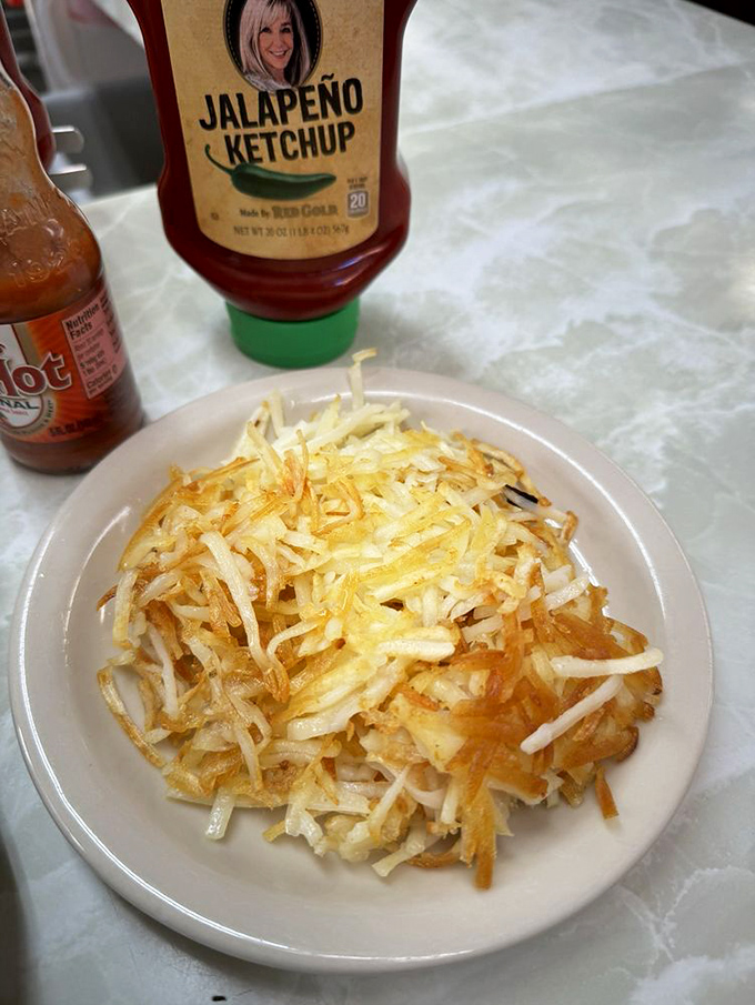 Hash browns that achieved the impossible dream: perfectly crisp outside, tender inside. The unsung heroes of breakfast.