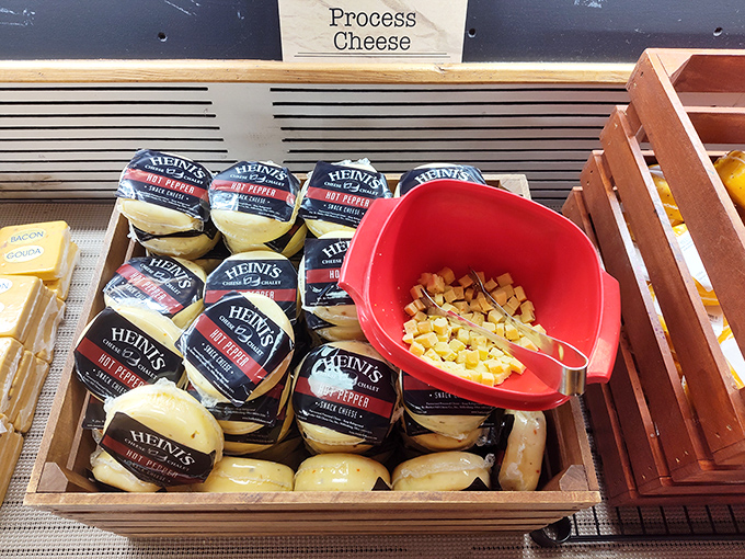 The sample station&mdash;where life-changing decisions happen one toothpick at a time. That little red scoop has witnessed countless "Aha!" moments in cheese discovery.