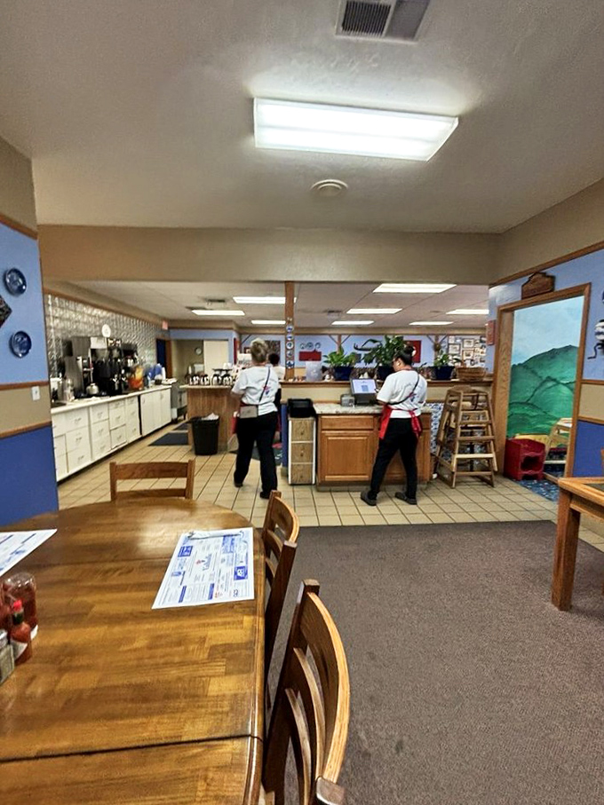 Where breakfast magic happens: Servers glide between tables delivering plates of Danish delights while regulars exchange knowing nods.