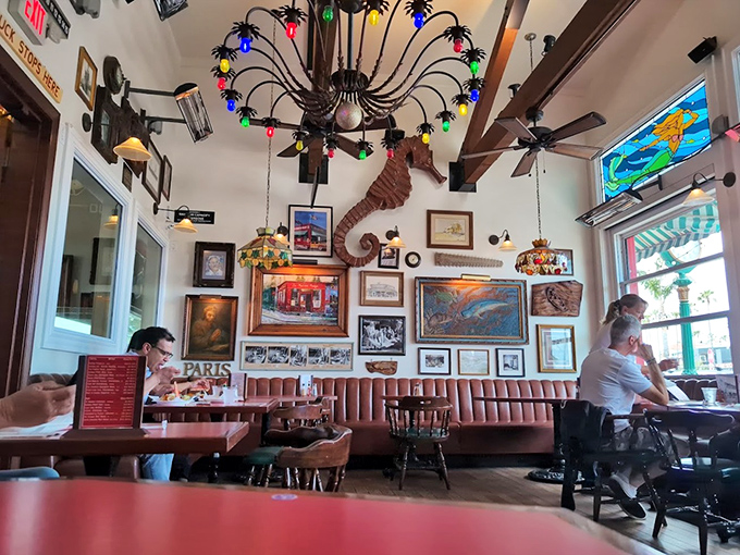 The walls tell stories of maritime adventures while colorful lamps cast a glow that makes everyone look like they're having the best day ever.