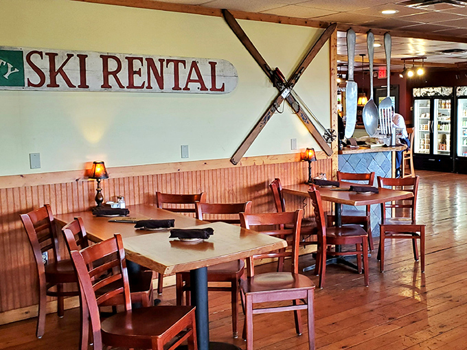 The "ski rental" sign and crossed skis aren't just decoration&mdash;they're conversation starters in a space where lingering over coffee feels not just allowed but encouraged.