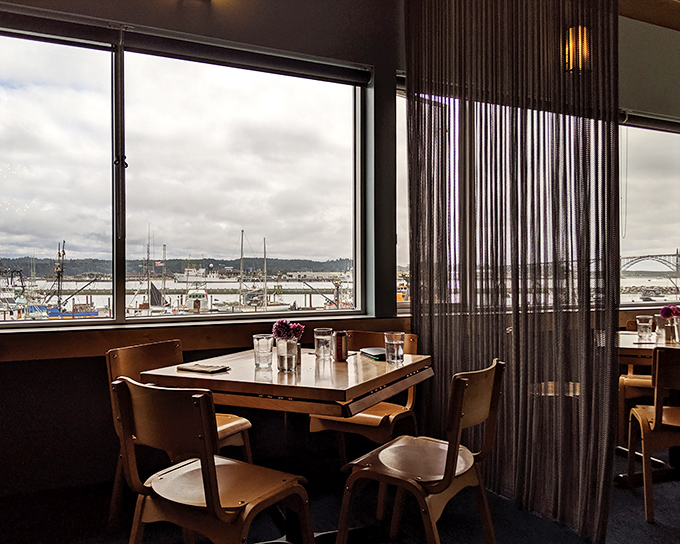 A table with a view that no Instagram filter could improve. Dining with the working harbor as your backdrop adds seasoning no chef could bottle.