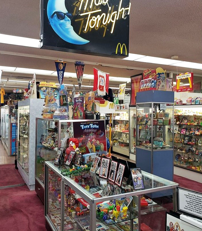 Glass cases overflow with decades of McDonald's memorabilia, each piece a portal to yesteryear. 