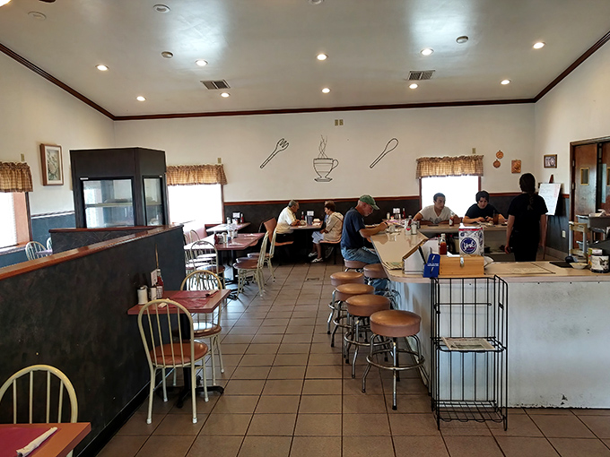 Counter seating for solo diners who understand that breakfast eaten alone at Mary's still comes with a side of community.