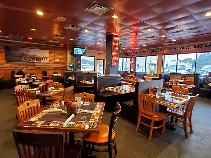 The dining room feels less like a restaurant and more like a community living room where stories are shared over plates of smoky goodness.