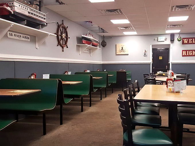 The empty booths await the morning rush like theater seats before a beloved show &ndash; green vinyl booths that have cradled countless conversations.