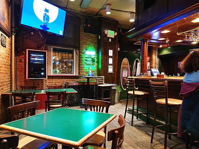Green-topped tables and exposed brick create that rare atmosphere where both first dates and decades-long friendships feel equally at home.