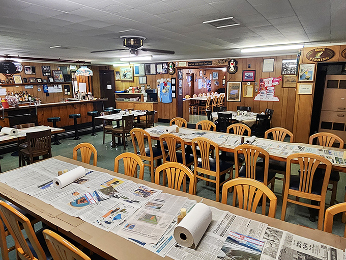 Tables covered in newspaper tell you everything you need to know: prepare for a delicious mess where formality takes a backseat to flavor.