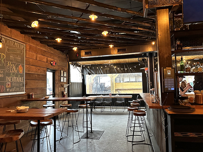 Wooden walls, industrial lighting, and bar seating that invites you to settle in. This isn't just a meal &ndash; it's an afternoon well spent.