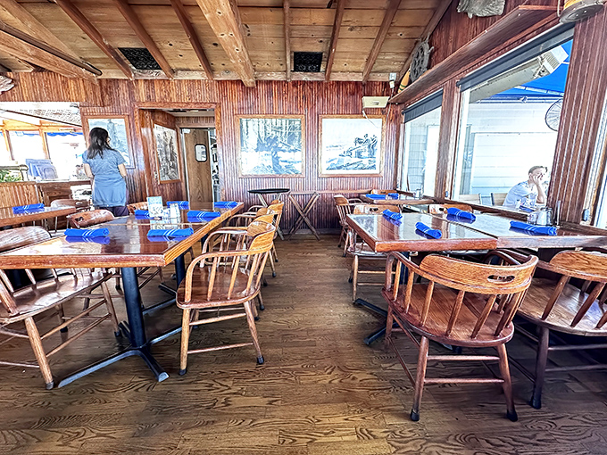 The dining room feels like your seafaring uncle's cabin&mdash;if your uncle happened to have impeccable taste and prime oceanfront real estate.