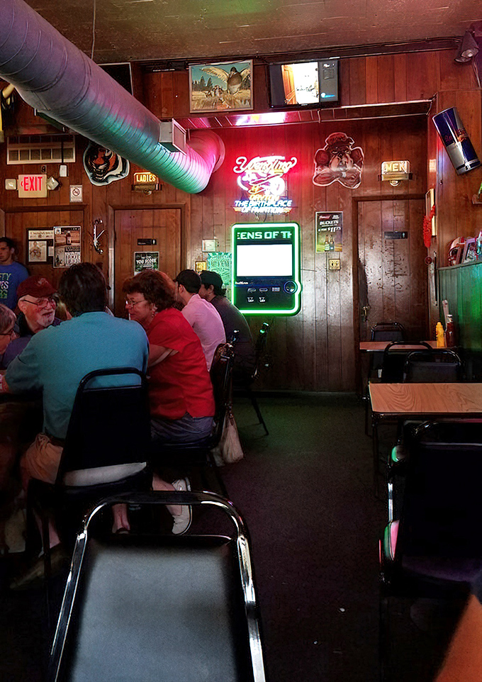 Neon signs cast their glow over decades of memories, while wood-paneled walls hold the echoes of countless celebrations.