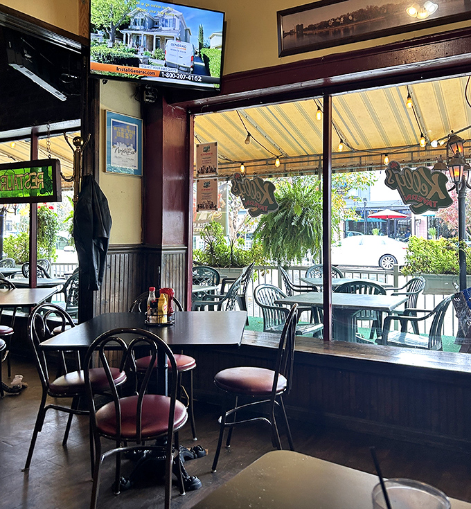 Sunshine streams through windows illuminating a dining room where countless Norfolk stories have unfolded. The TV might be on, but the real entertainment is at your table.