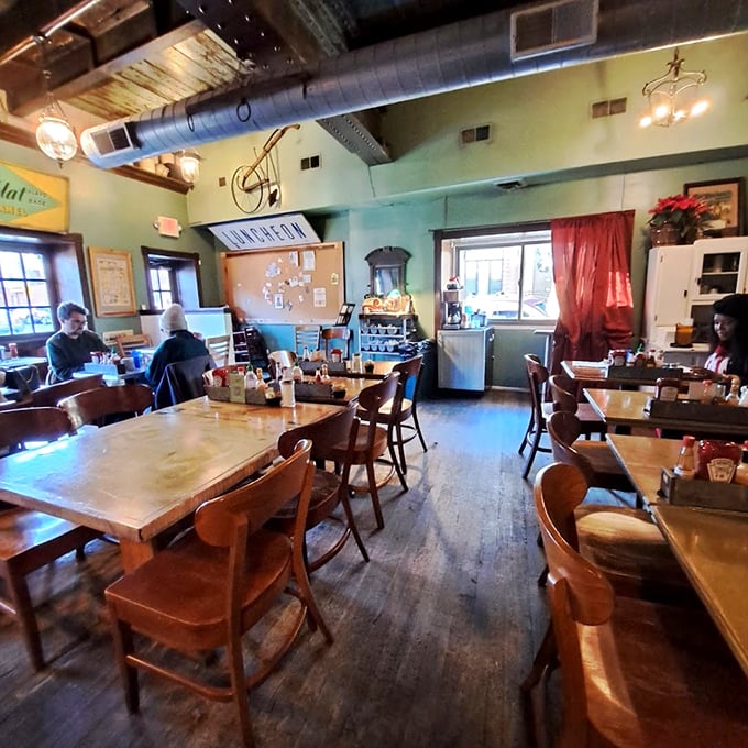 Wooden tables, exposed beams, and mint walls create that rare atmosphere&mdash;somewhere between your grandmother's kitchen and the coolest diner in town.