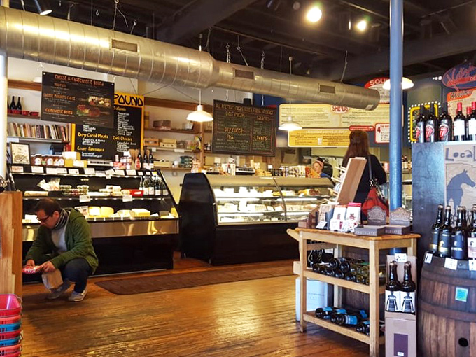 The bustling interior where conversations flow as freely as the mustard and memories are made daily.