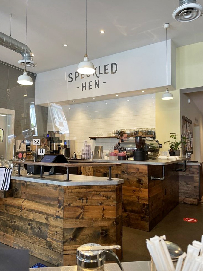 The counter area combines rustic wood with clean white subway tile, creating a space that's both Instagram-worthy and genuinely inviting.