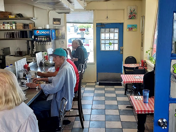 Where breakfast memories are made. The blue door entrance feels like a portal to a simpler time when calories didn't count.