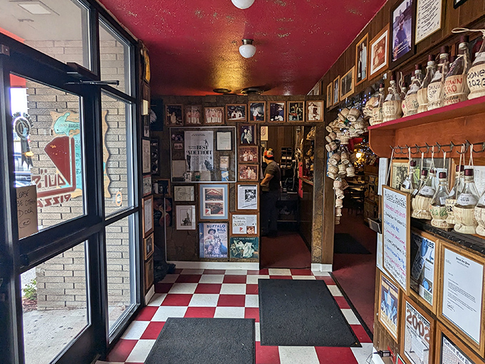 Red checkered floors and walls adorned with history. Walking in feels like entering the family album of Detroit's pizza legacy.