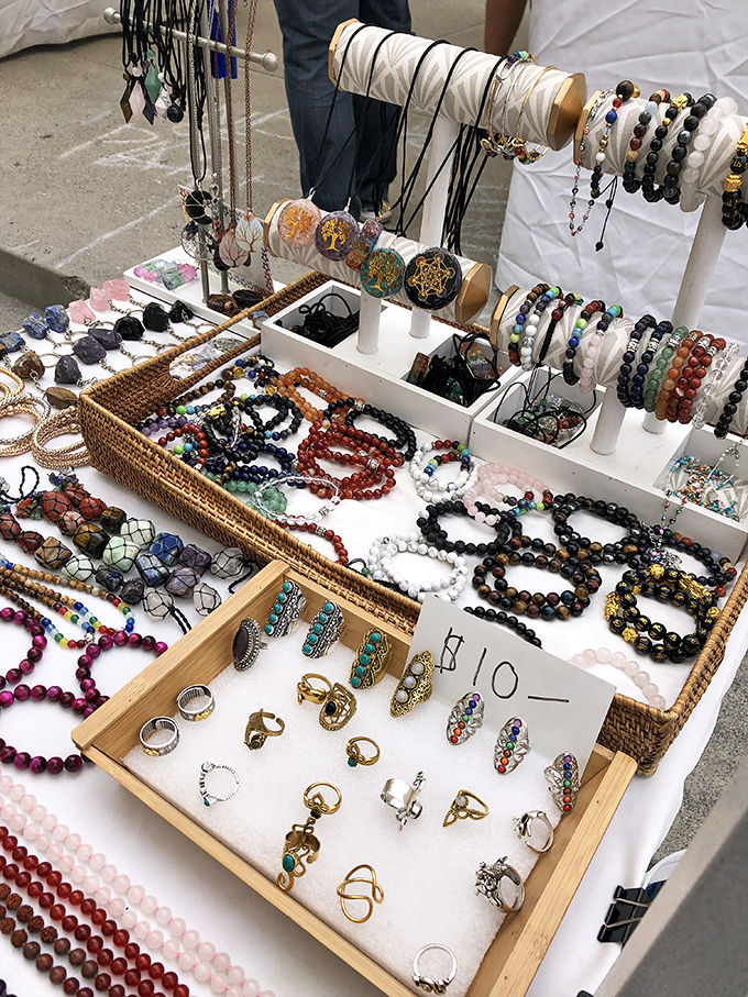 Handcrafted jewelry displays sparkle with unique pieces that mass-produced accessories simply cannot match or replicate. 
