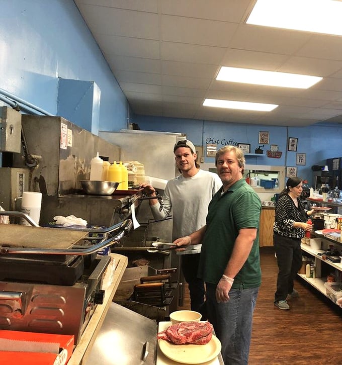 The kitchen – where magic happens without smoke and mirrors, just skilled hands that have flipped more burgers than most of us have had hot meals.