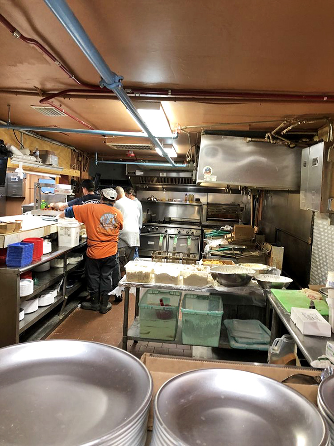 The kitchen ballet &ndash; where seafood goes from dock to divine in a choreographed dance of steam, sizzle, and Southern know-how.