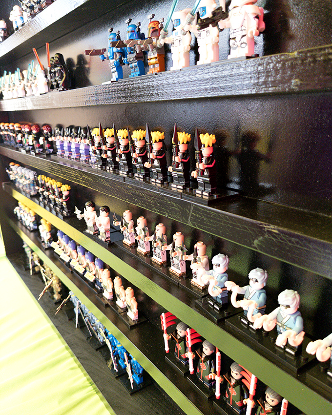 Tiny plastic armies standing at attention. These collectible figures silently promise to guard your bookshelf with miniature might.