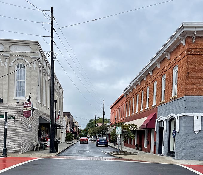Main Street after a rain shower has that fresh-washed glow, where historic buildings frame a scene straight from a nostalgic small-town film.