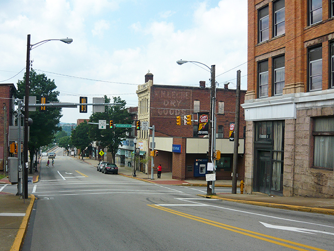 Main Street unfolds like the opening scene of a movie about rediscovering what matters. Traffic lights govern unhurried rhythms while hills cradle the business district in a protective embrace.